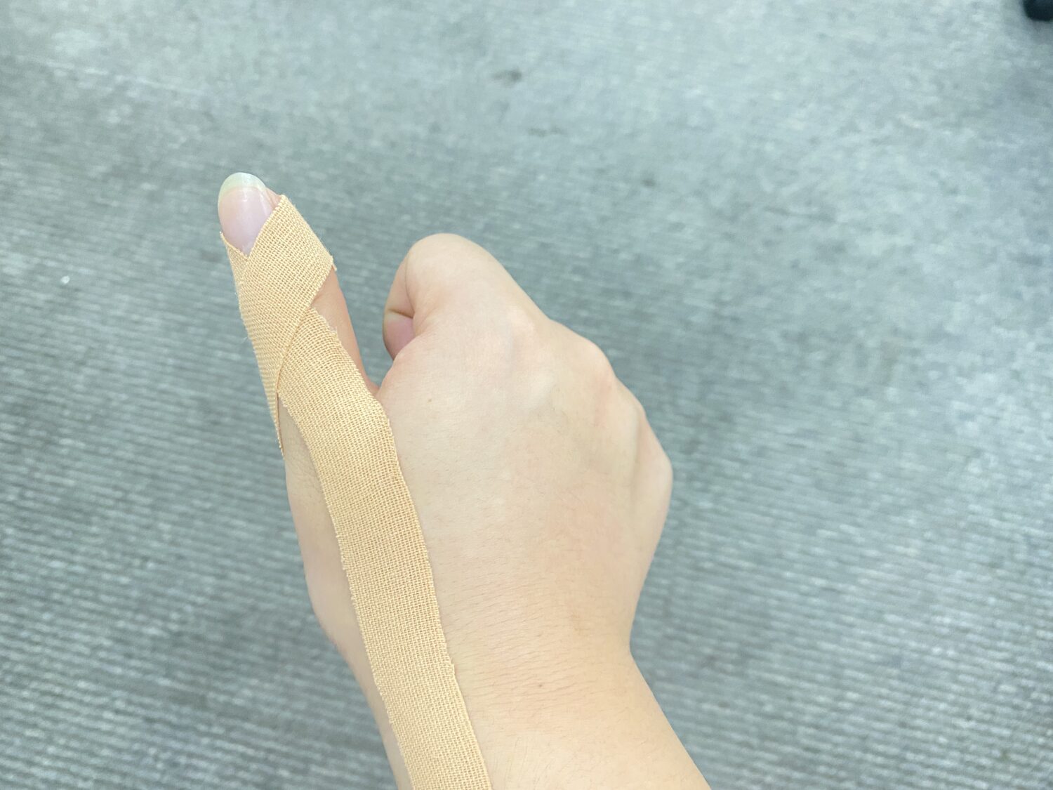 how to strap a thumb with kinesiology tape thumb